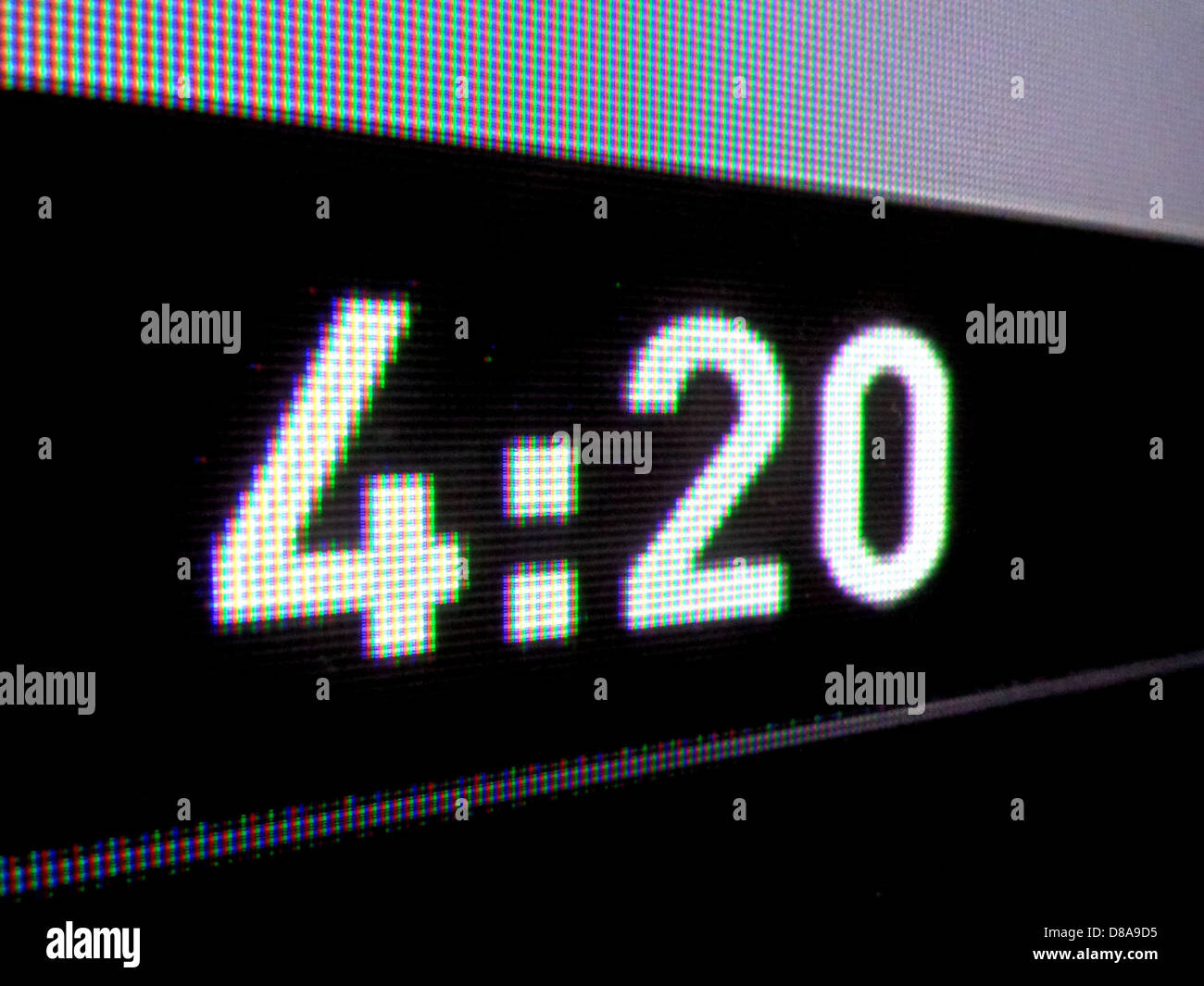 The image shows a digital clock displaying the time as 4:20, indicating ...