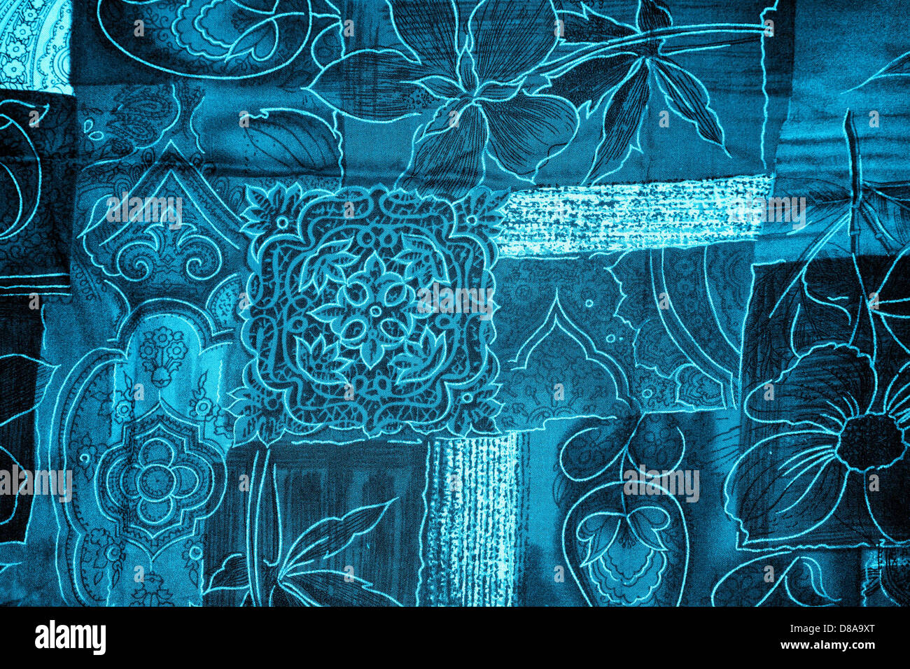 A stock photo showing an azure blue patchwork fabric, with various ...