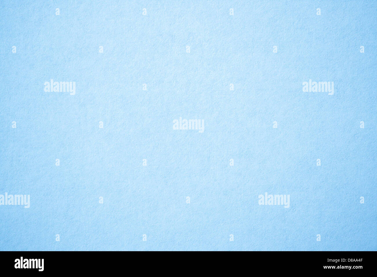 A soft, baby blue paper texture with a smooth surface. The gentle color ...