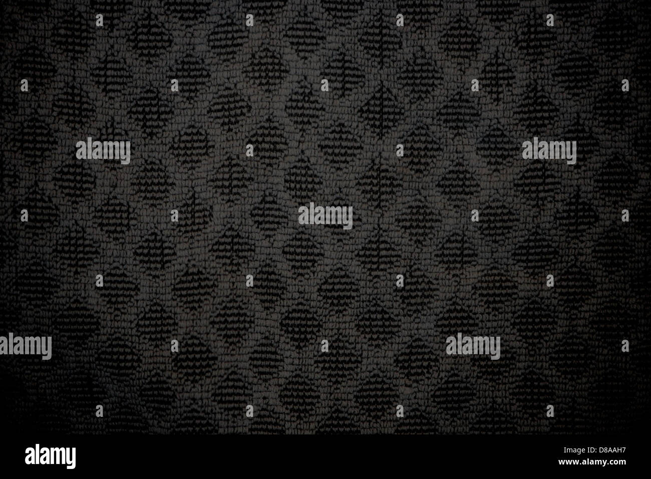 A black dish towel featuring a diamond pattern texture. The design adds ...