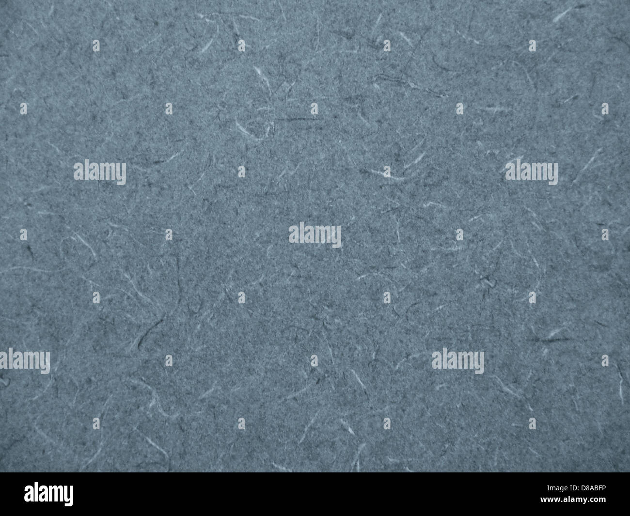 An abstract blue-gray pattern on a laminate countertop surface, showing ...