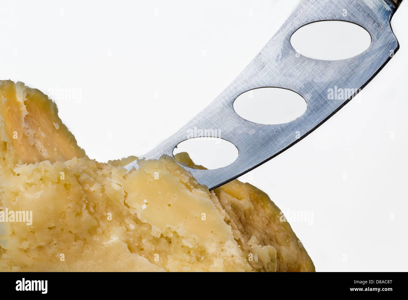 Traditional Parmesan cheese and a cutting knife Stock Photo - Alamy