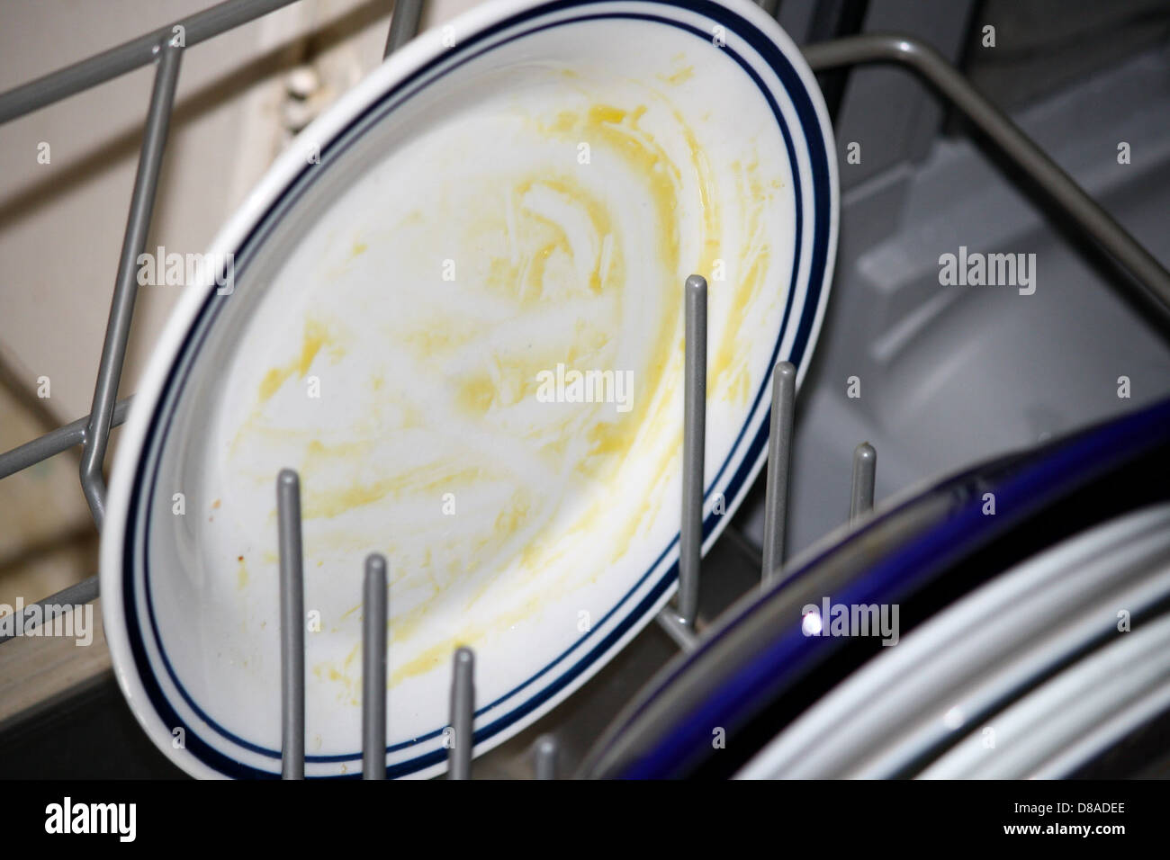 This image shows a dirty plate with food remnants still visible, yet ...