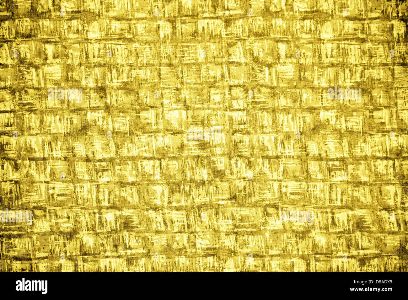 A textured fabric with a gold abstract pattern formed by squares ...