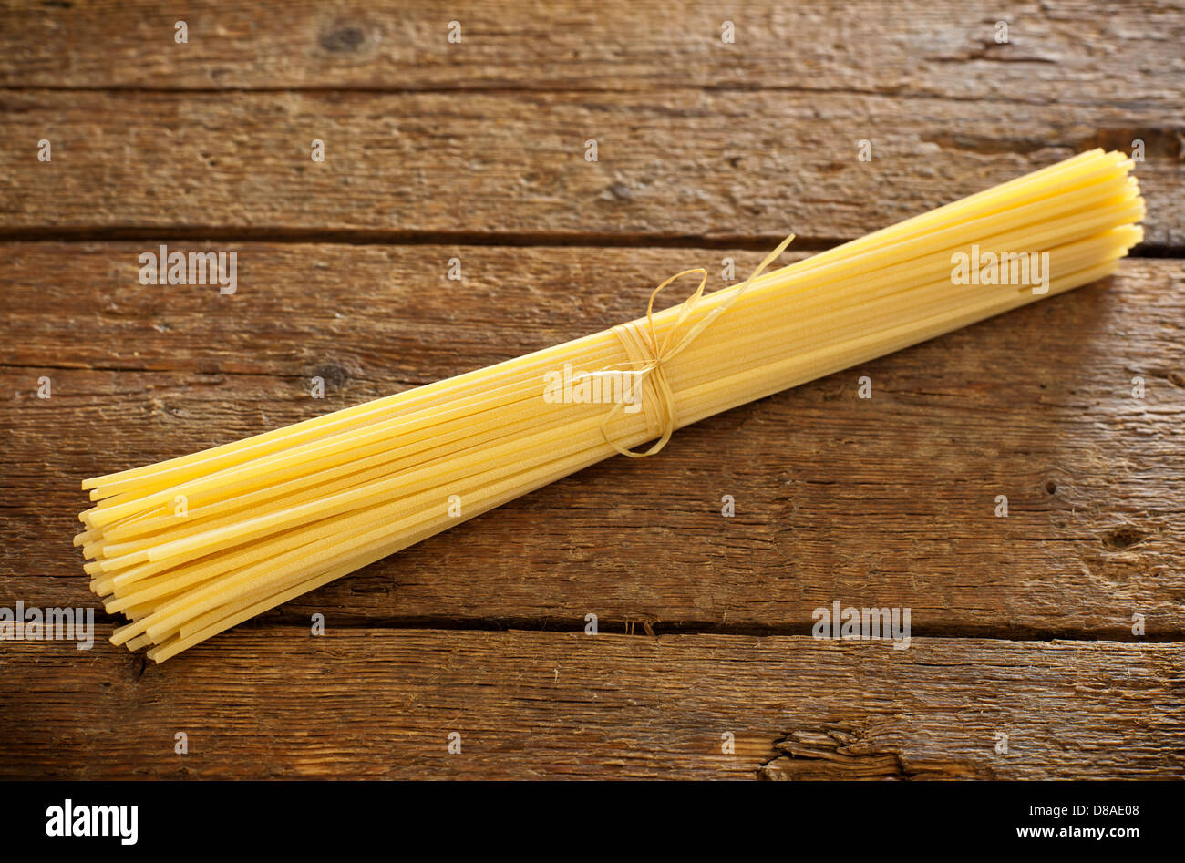 Dried spaghetti on rustic hi-res stock photography and images - Alamy