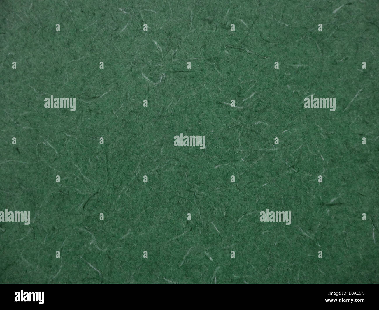 A green abstract pattern on a laminate countertop, showcasing a unique ...