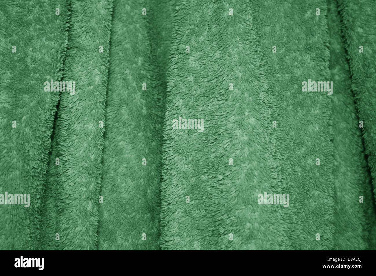 green terry cloth bath towel texture Stock Photo - Alamy
