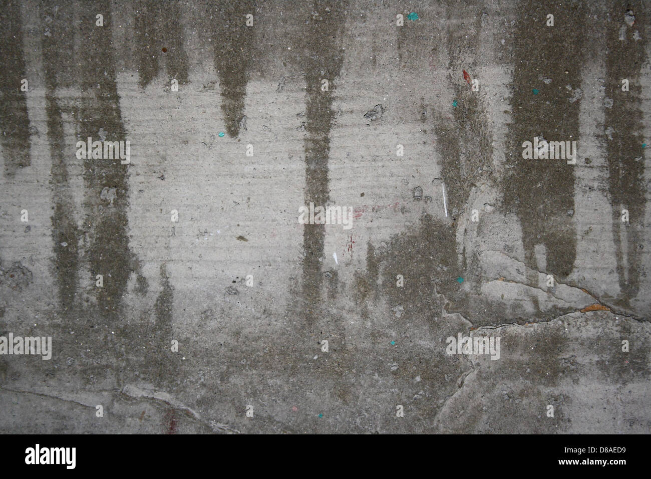 A textured close-up of grunge dripping paint splatters on a surface ...