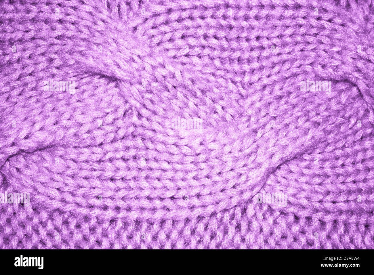 A close-up of a lavender-colored cable knit pattern, showcasing the ...
