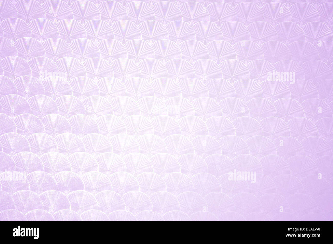 A lavender-colored plastic sheet with a circular pattern texture. The ...