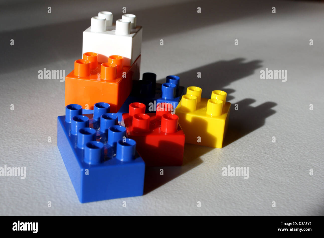 A collection of Lego-style blocks, showing a variety of colors and ...