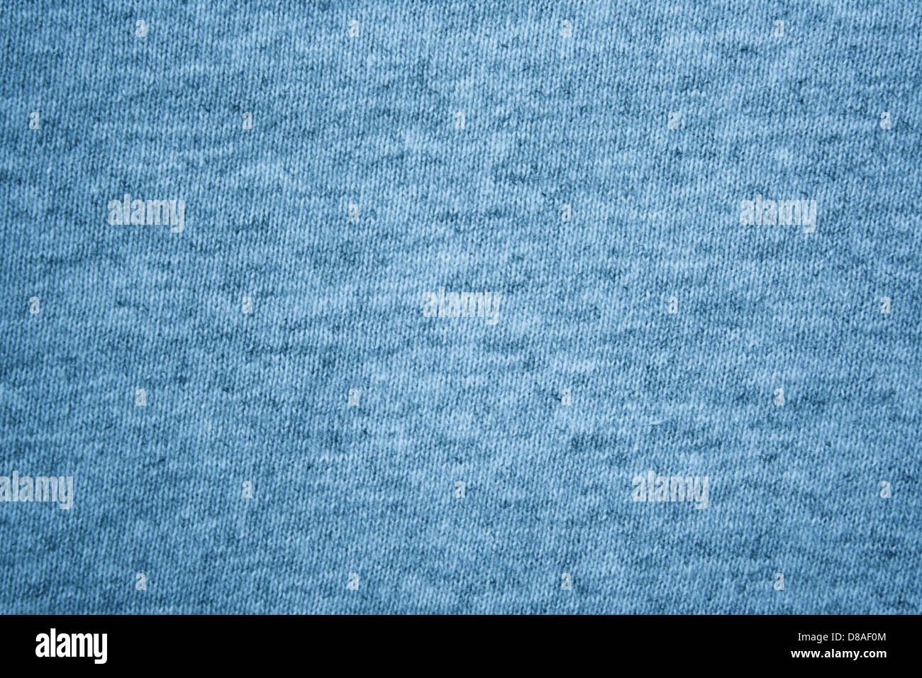 A close-up image of a light blue heather knit fabric, showcasing the ...