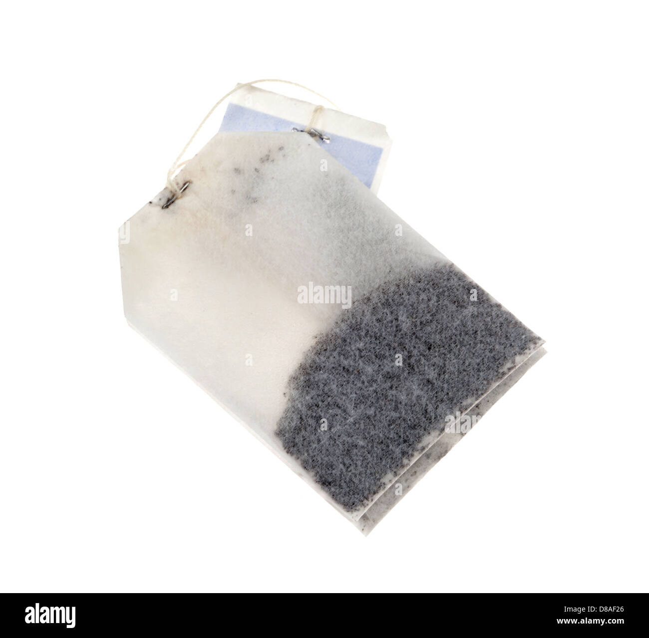 SIngle tea bag over a white background Stock Photo - Alamy