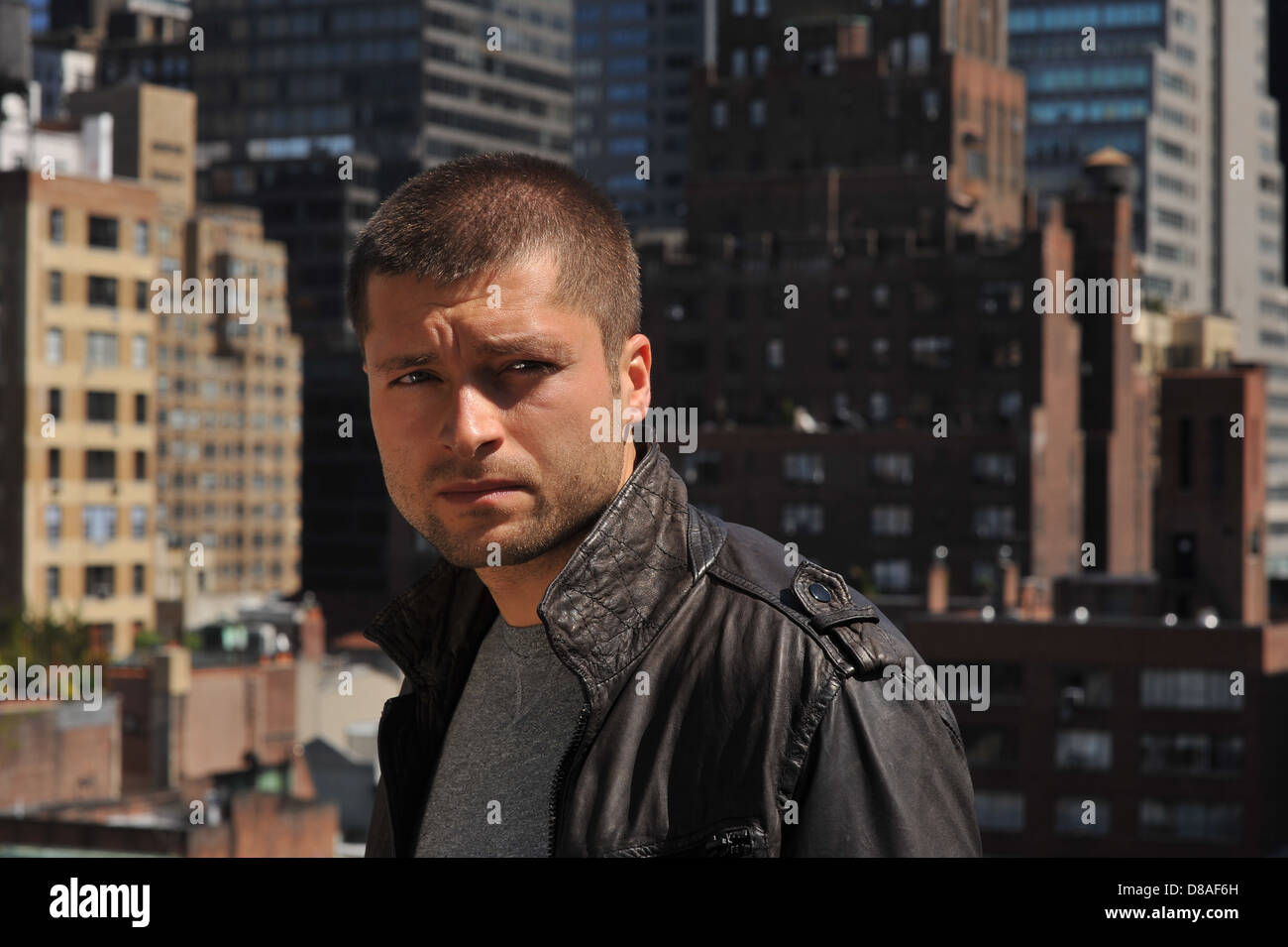 Male actor head shot showing action movie character Stock Photo - Alamy