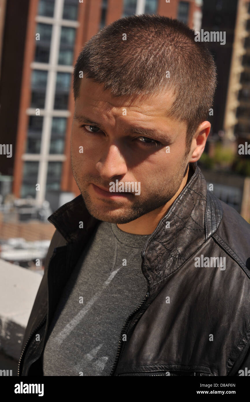 Male actor head shot showing action movie character Stock Photo - Alamy