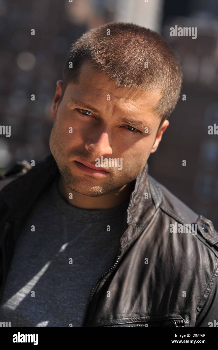 Male actor head shot showing action movie character Stock Photo - Alamy