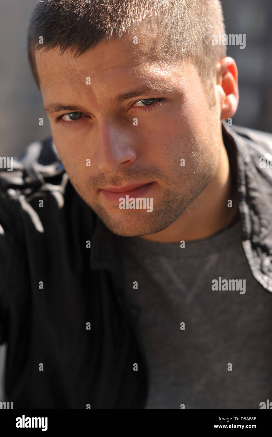 Male actor head shot showing action movie character Stock Photo - Alamy