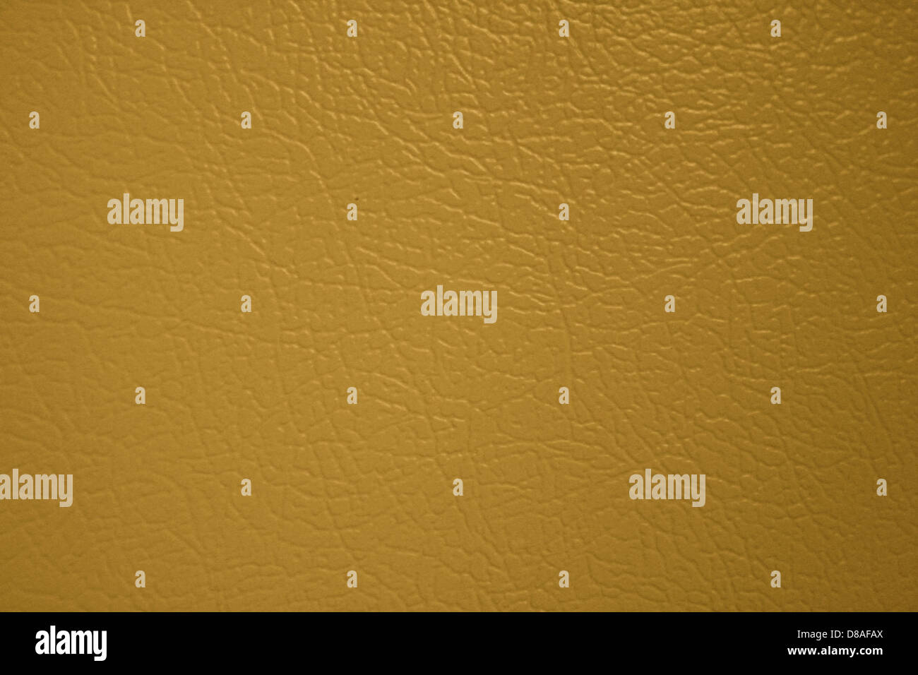 marigold faux leather texture Stock Photo - Alamy