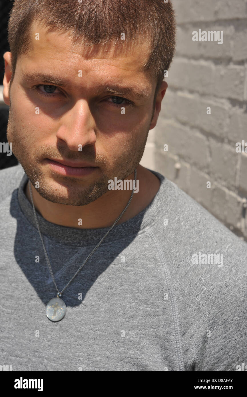Male actor head shot showing action movie character Stock Photo - Alamy