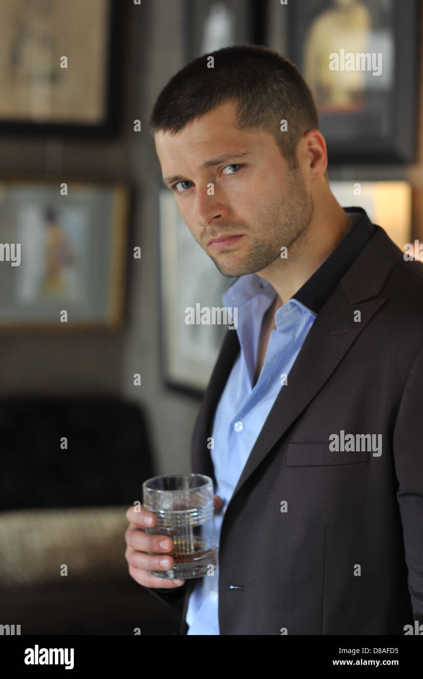 Male actor head shot showing action movie character Stock Photo - Alamy