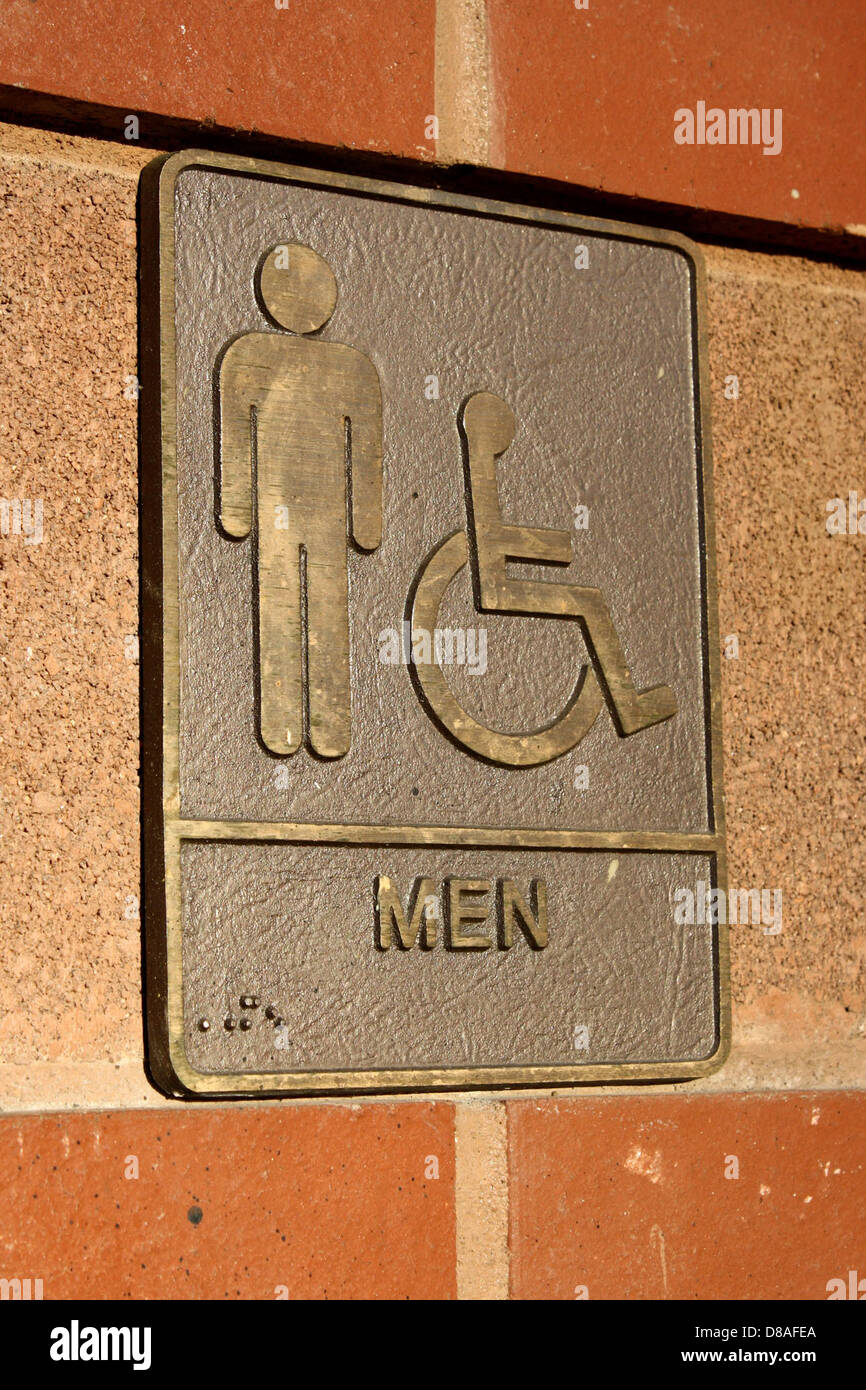 mens rest room sign brass plaque Stock Photo - Alamy