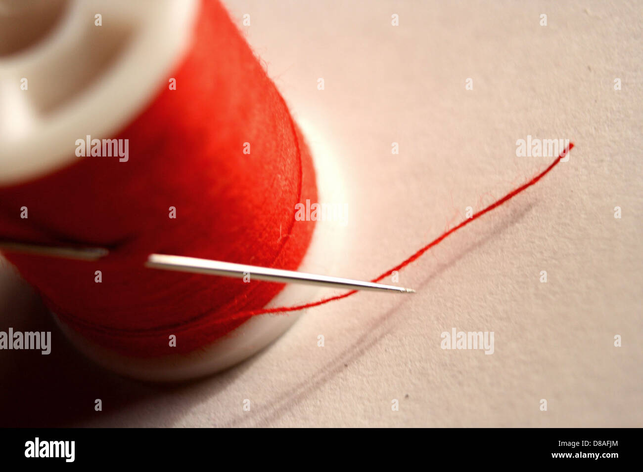 needle and thread Stock Photo - Alamy