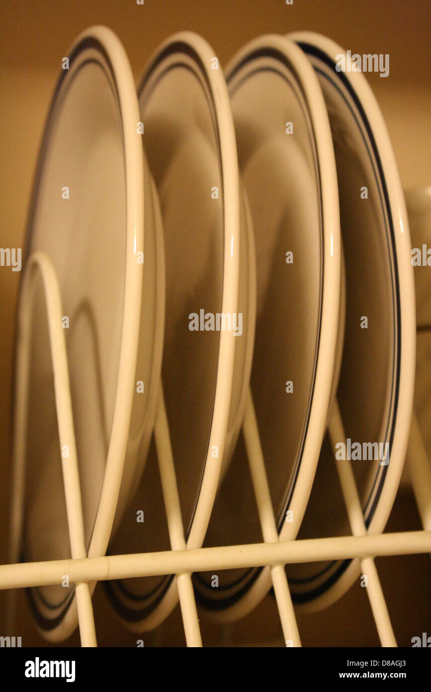 A collection of plates arranged on a surface, showcasing their varying ...