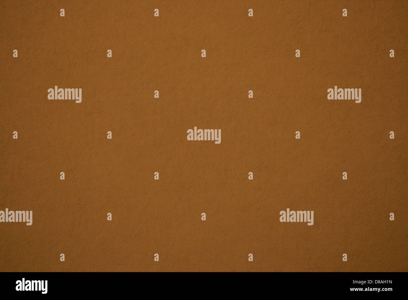 A close-up view of rust brown paper texture, highlighting the organic ...