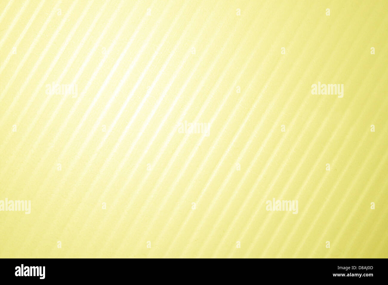 yellow diagonal striped plastic texture Stock Photo - Alamy