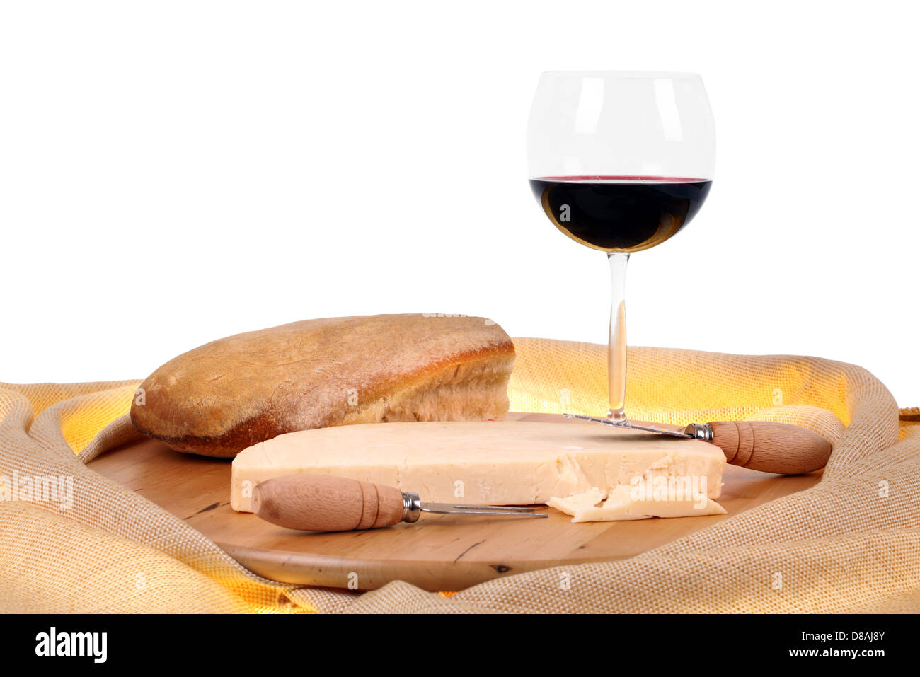 Italian spicy provolone cheese with red wine and bread on white ...