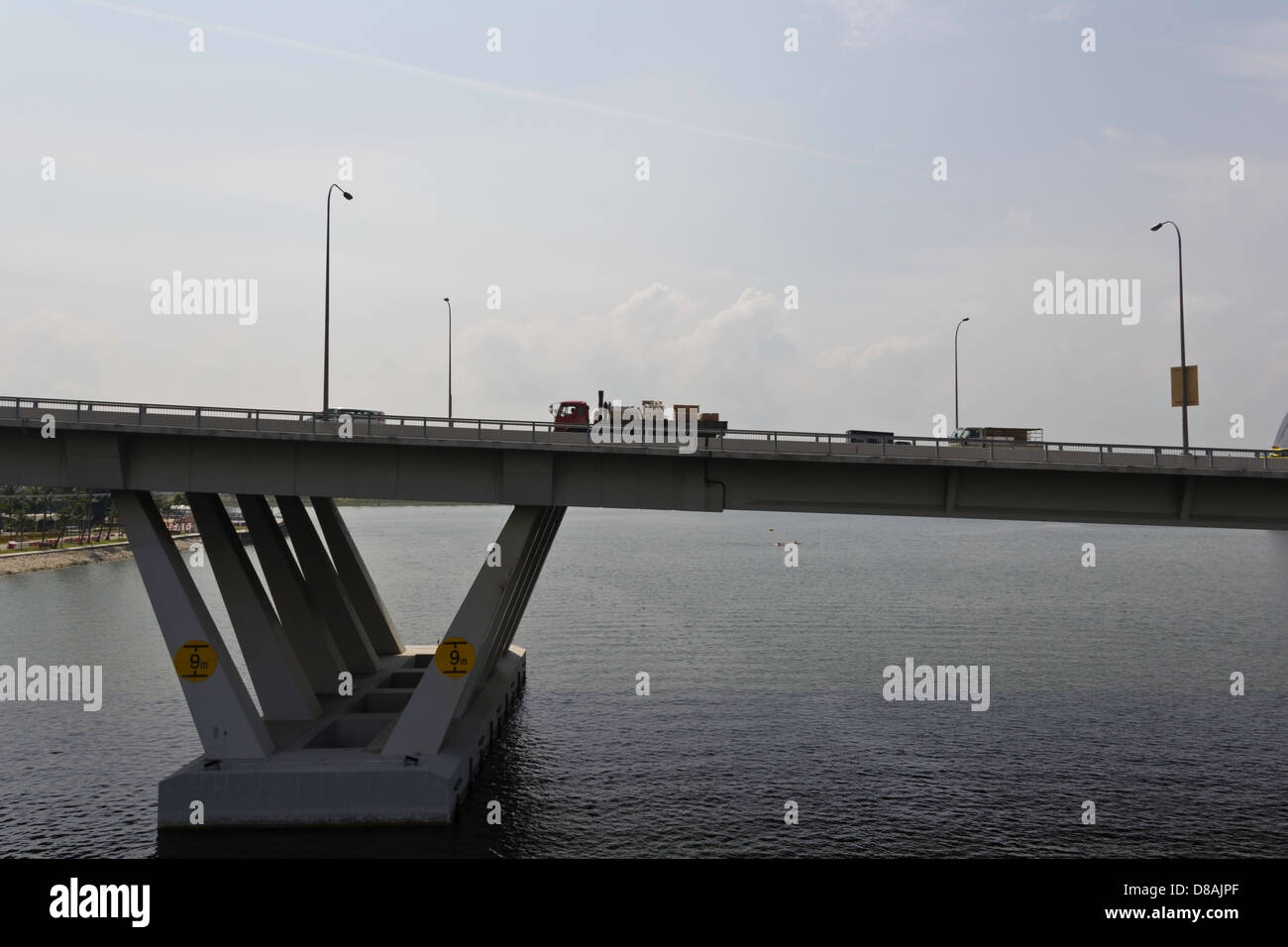 Span of the Benjamin Sheares Bridge in Singapore and a truck passing ...