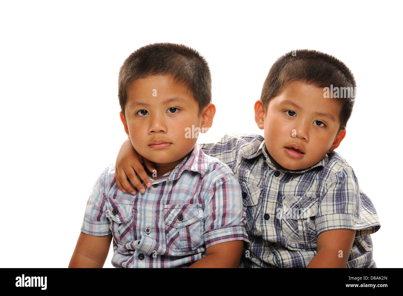 Portrait two boys twins holding hi-res stock photography and images - Alamy