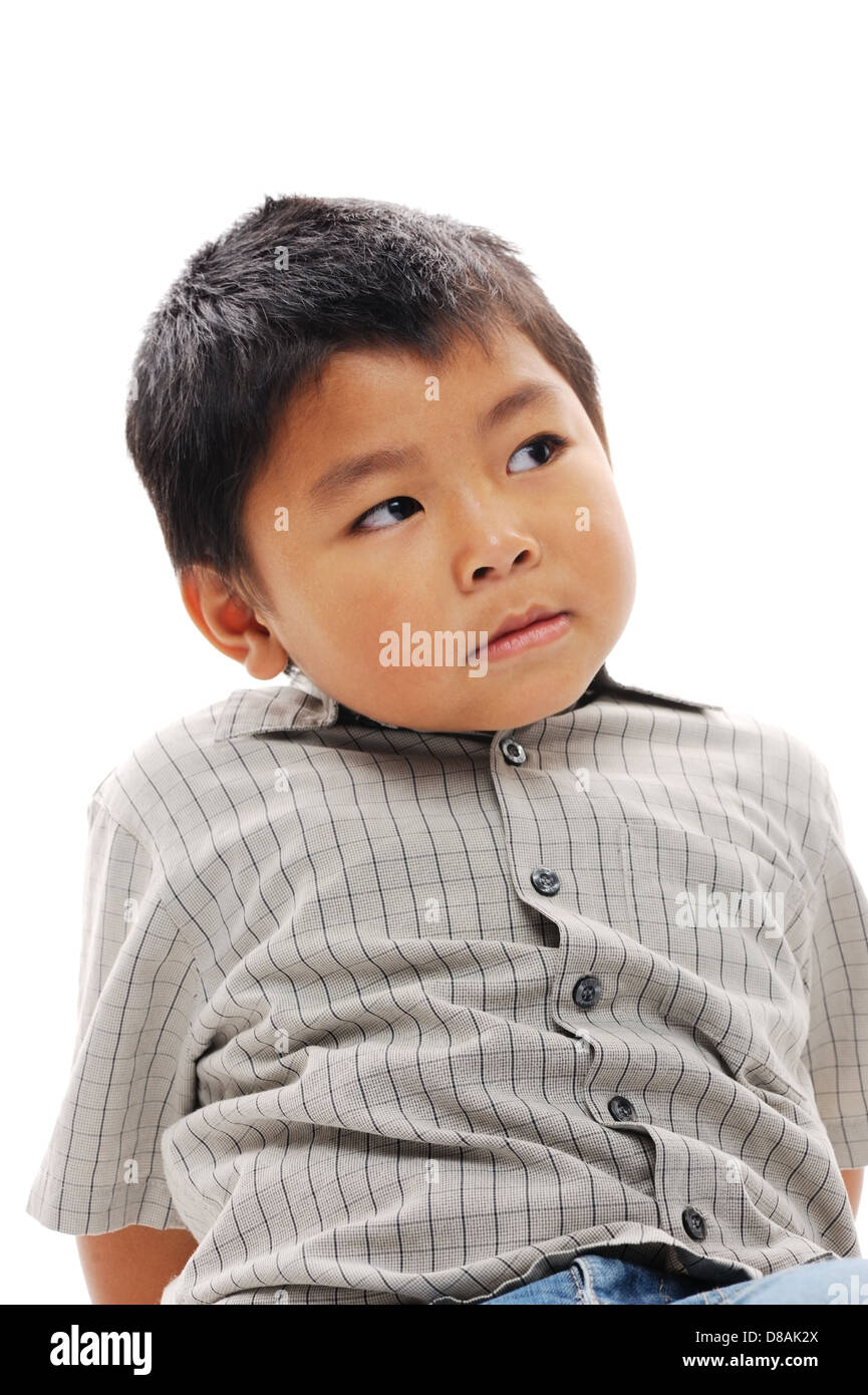 Asian boy looking serious and contemplating Stock Photo - Alamy