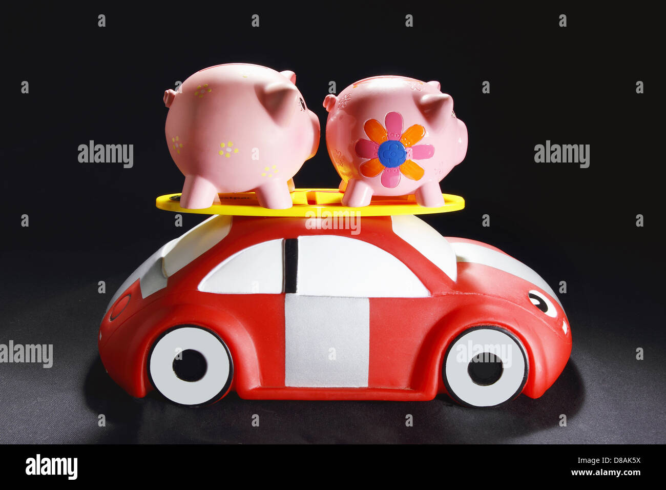 Piggy Banks on Toy Car Stock Photo - Alamy
