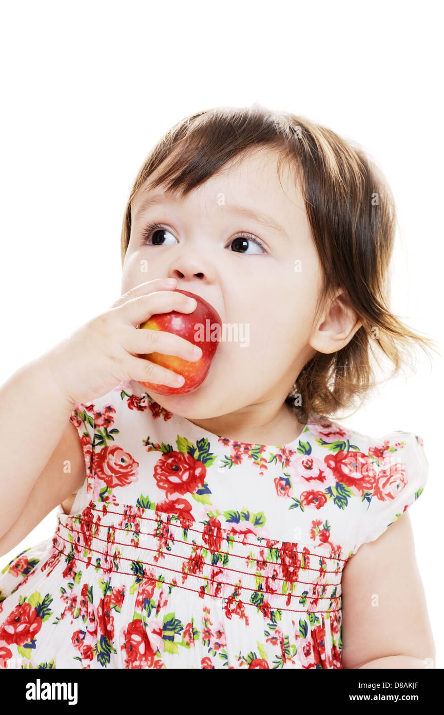 young girl biting an apple closeup portrait Stock Photo - Alamy