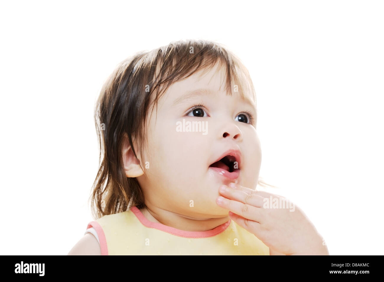 Young expressive girl posing looking cute Stock Photo - Alamy