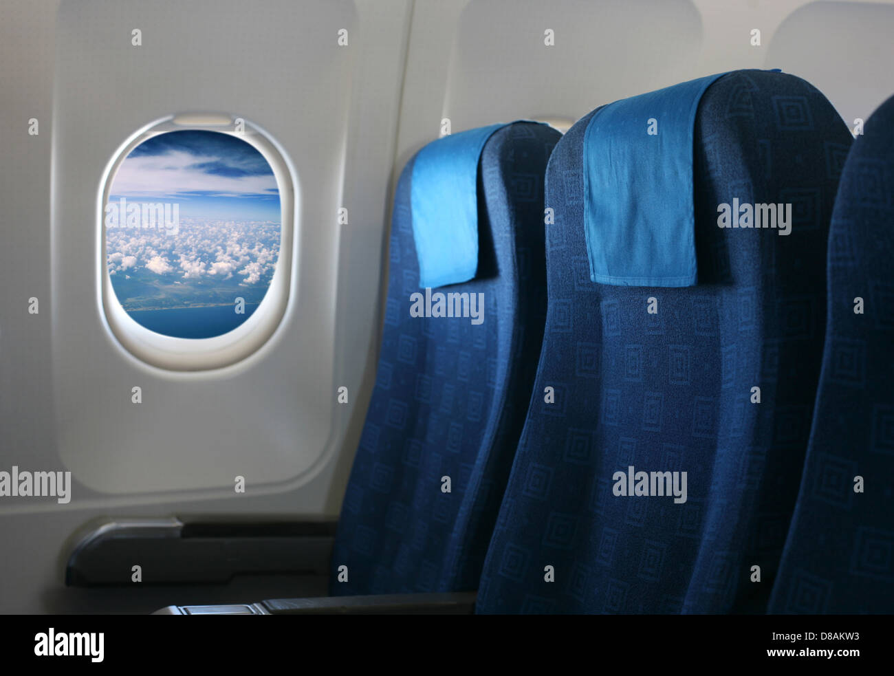 Airplane seat and window inside an aircraft Stock Photo - Alamy