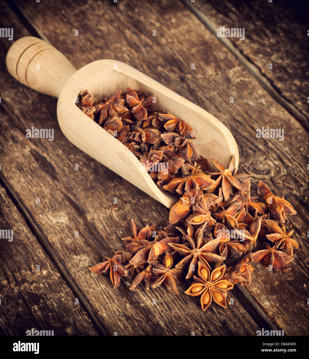 Stars anise on wooden table Stock Photo - Alamy