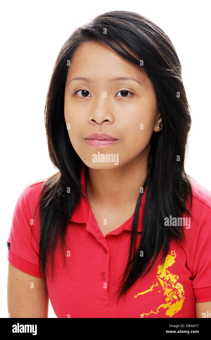 Asian girl looking serious in red shirt Stock Photo - Alamy