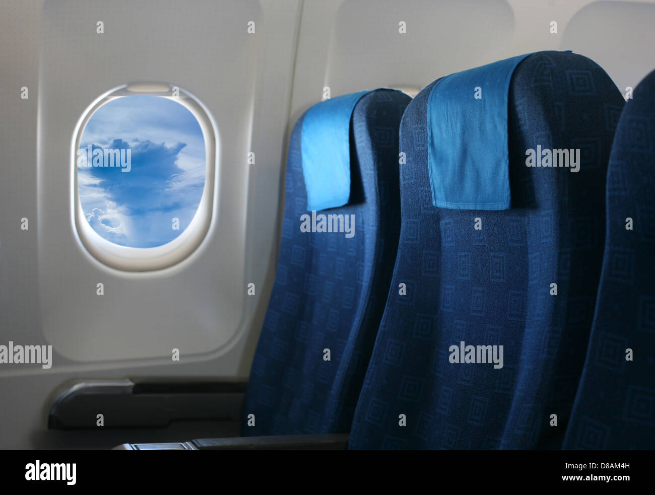 Airplane seat and window inside an aircraft Stock Photo - Alamy