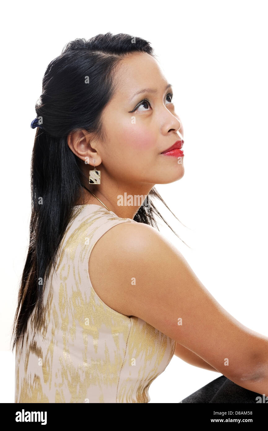 Asian girl looking serious and thoughtful Stock Photo - Alamy