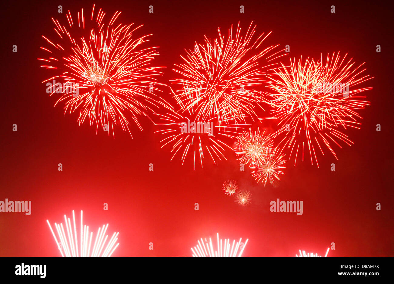 Fireworks blooming on the night sky Stock Photo - Alamy