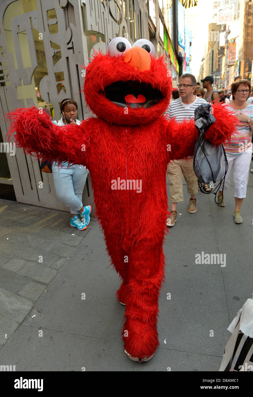 New York, USA. 21st May 2013. A person wearing a red Elmo costume, of ...