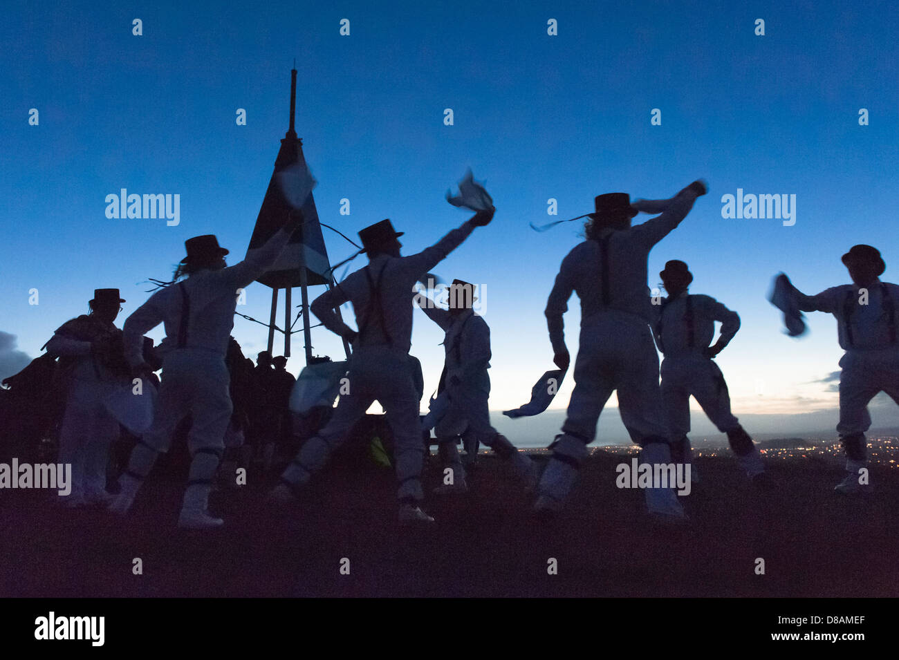 Morris dancers, dancing up the sun on top of Mount Eden at dawn on May ...