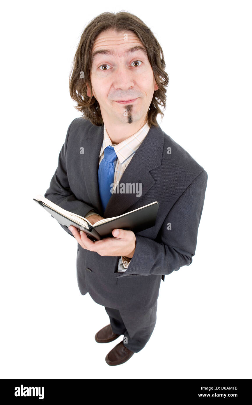 silly young businessman full length with a book Stock Photo - Alamy
