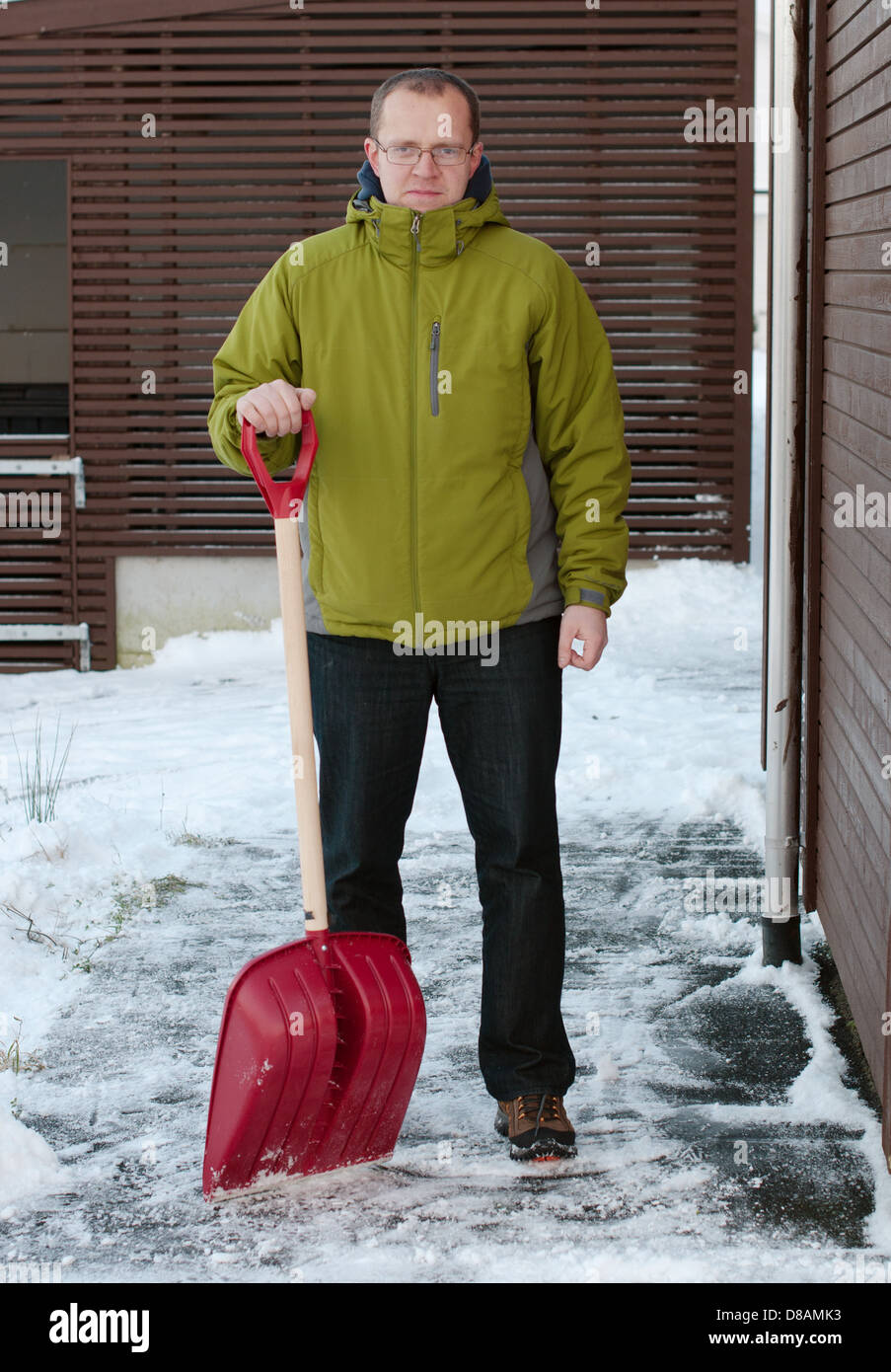 Outdoors photo of the man with a spade Stock Photo - Alamy