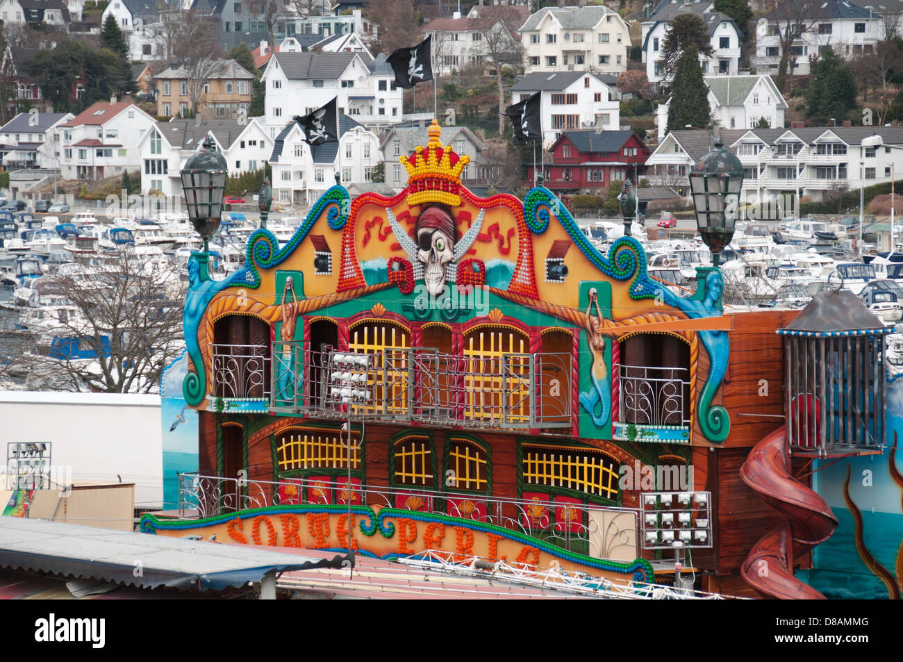 The vertical photo of the tivoli attraction on the background of town ...