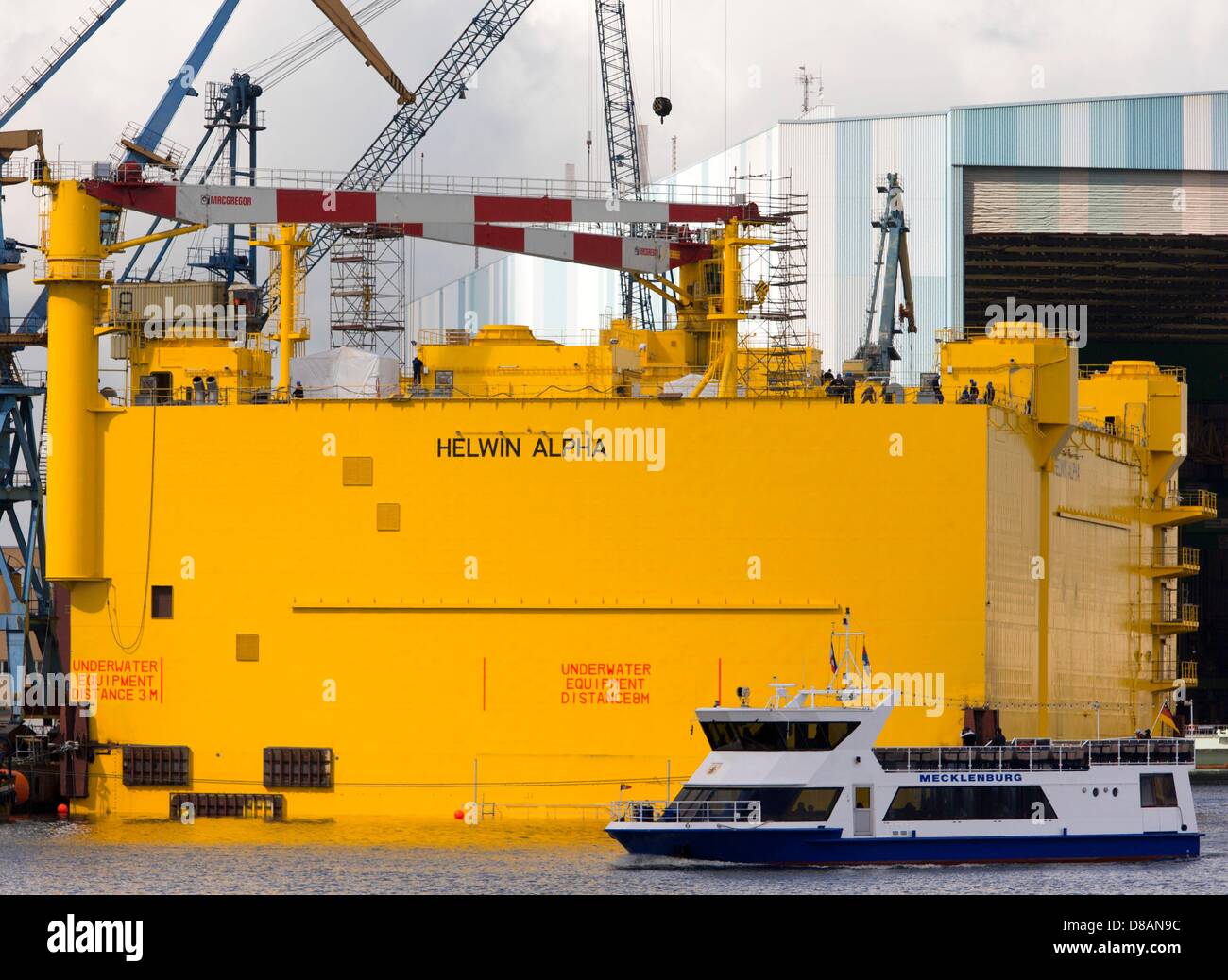 A steamer goes past the offshore platform HelWin alpha at the ...