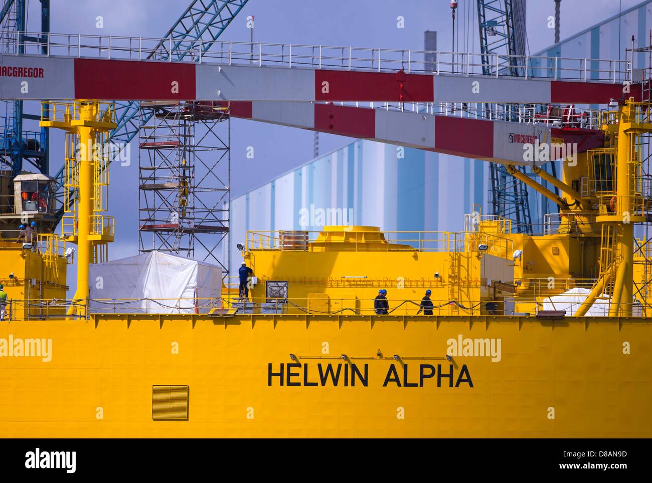 Workers work on the offshore platform HelWin alpha at the shipbuilding ...