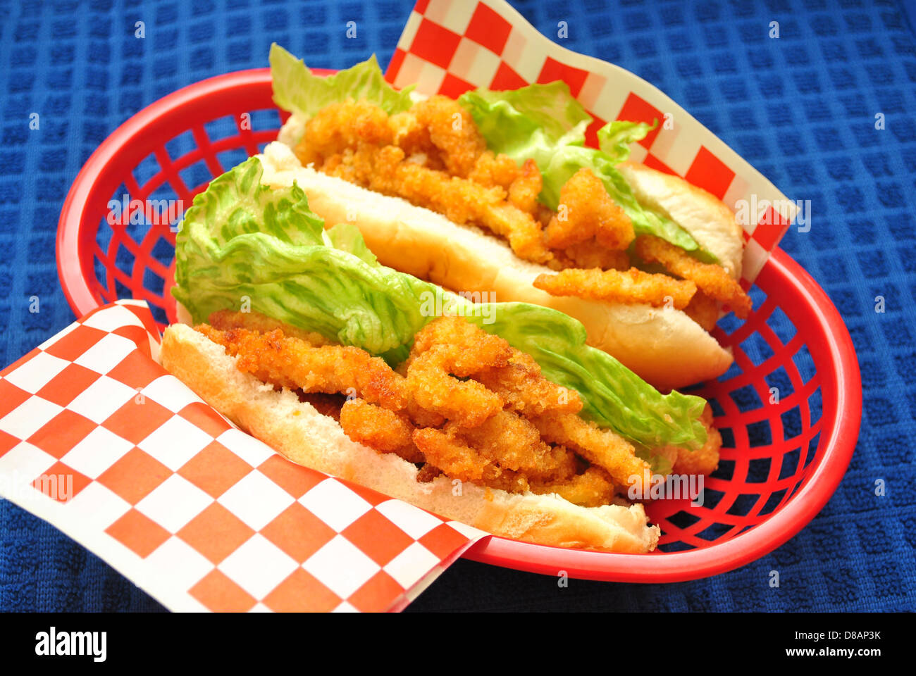 Two Clam Rolls Over a Blue Background Stock Photo - Alamy
